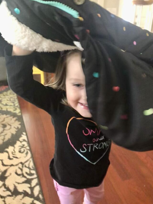 How to Teach the Montessori Coat Flip — The Montessori-Minded Mom